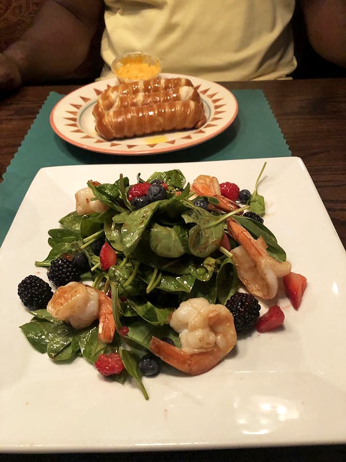 A salad that doesn't apologize for being healthy. Those berries and shrimp are having the kind of party your doctor would actually approve of.