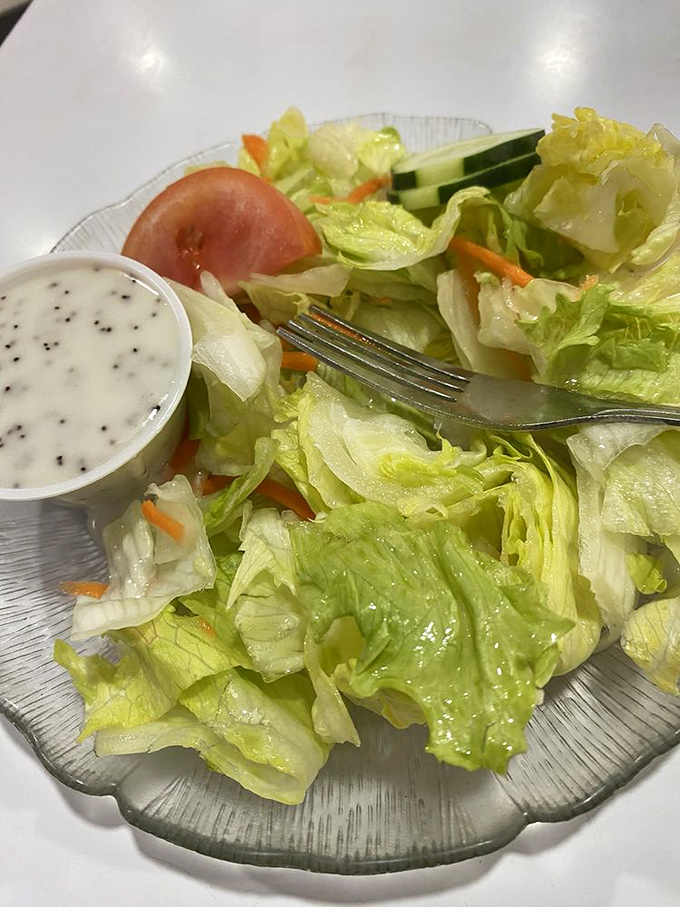 Even the side salad gets the respect it deserves&mdash;crisp, fresh, and served in a scalloped glass dish that your grandmother would approve of.