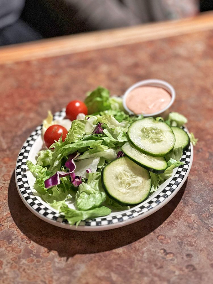 A garden-fresh side salad that proves vegetables can be more than an obligation&mdash;crisp, colorful, and the perfect counterpoint to diner indulgence.