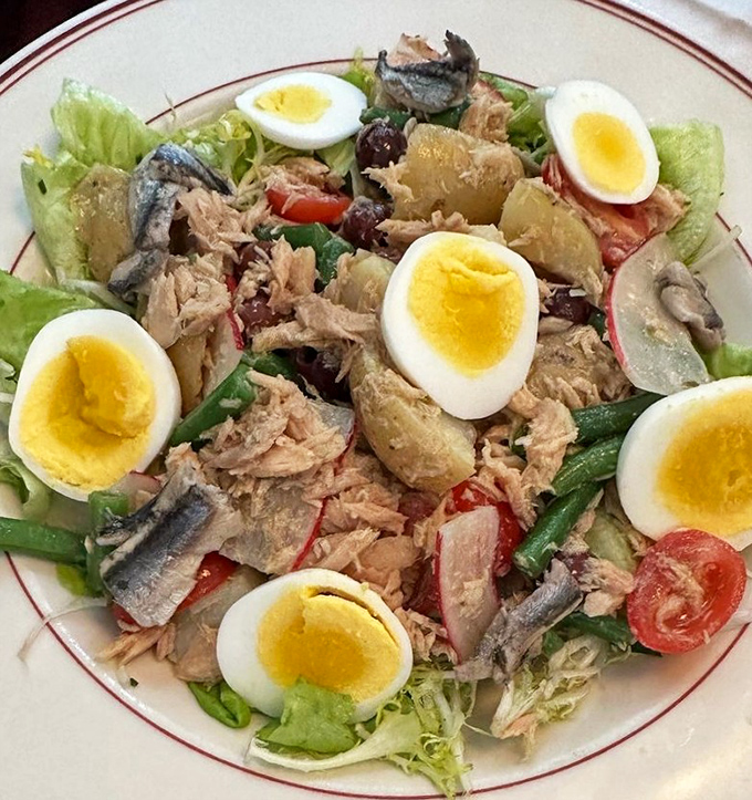 Ni&ccedil;oise salad arranged with such care you almost feel bad dismantling it. Almost.