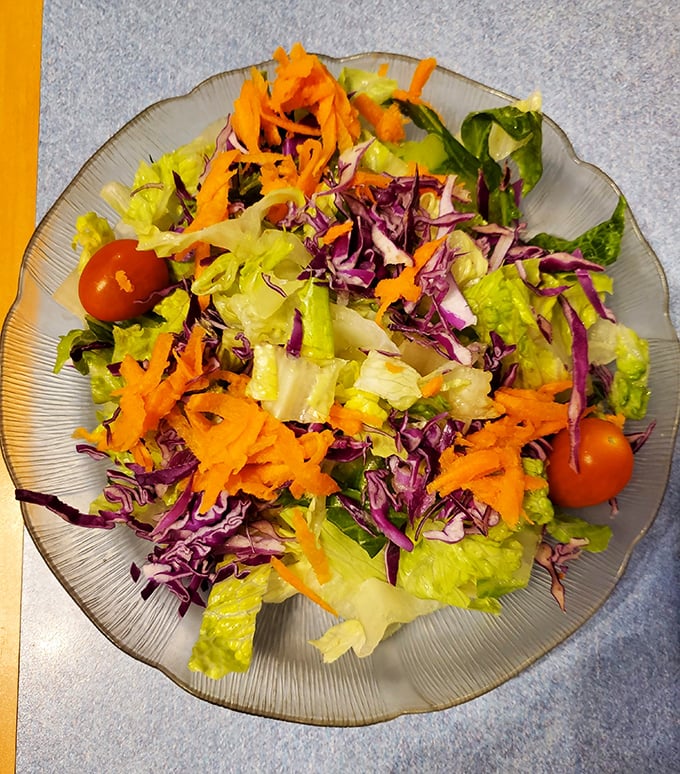 A salad that doesn't apologize for being healthy. Those vibrant colors are nature's way of saying "eat me before the main course arrives."