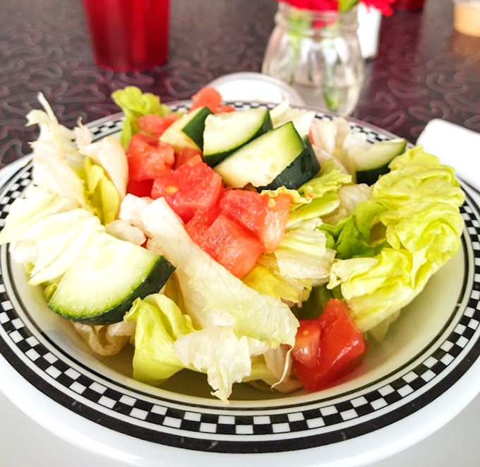 Even the salads at Carl's understand their role&mdash;fresh, colorful supporting characters in a diner where comfort food plays the lead.