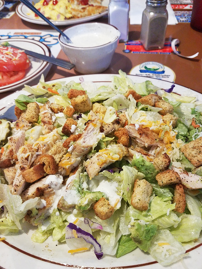 A salad this abundant makes you forget you're being virtuous&mdash;crisp lettuce, grilled chicken, and enough croutons to make a carb-counter nervous.