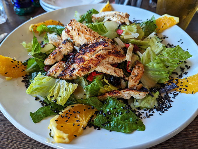 A salad that doesn't feel like punishment. Grilled chicken and citrus bring this green ensemble into "actually crave-worthy" territory.