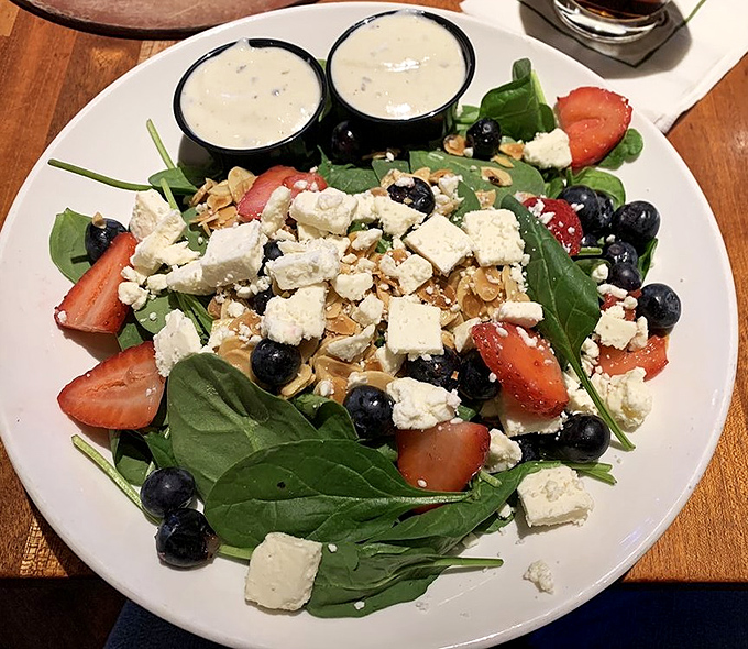 A fresh spinach salad that proves vegetables can be exciting too &ndash; especially when feta, berries, and nuts join the party.