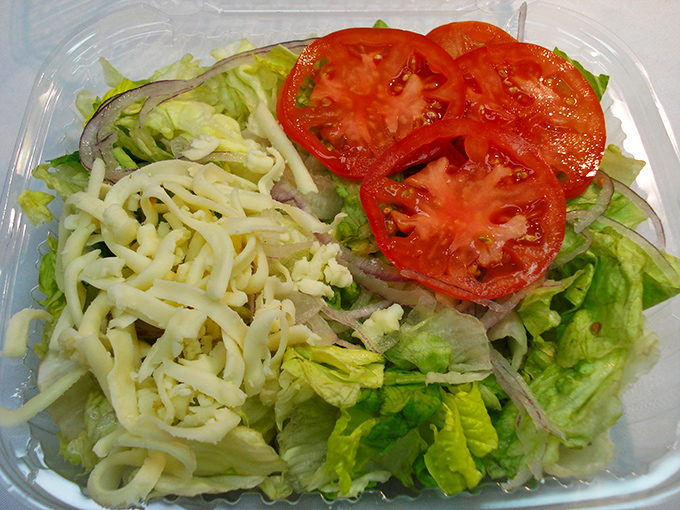 Even the salad looks like it's having a good time&mdash;fresh, vibrant, and ready to play the supporting role to your main event.