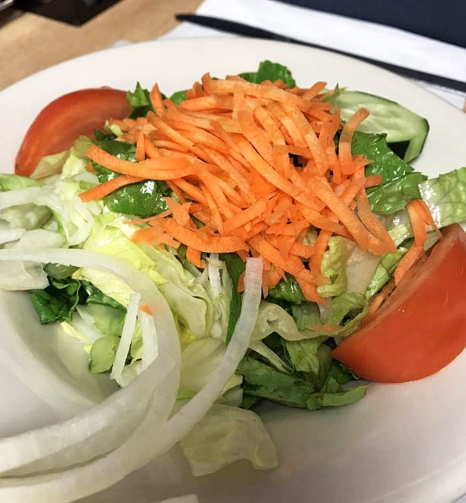 Fresh greens piled high with enough toppings to make your salad feel like a celebration.