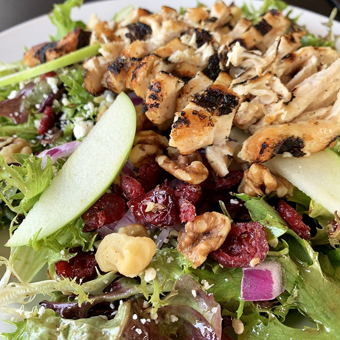 Not all heroes wear capes&mdash;some wear grilled chicken atop a bed of greens, cranberries, and walnuts for those pretending to be virtuous.