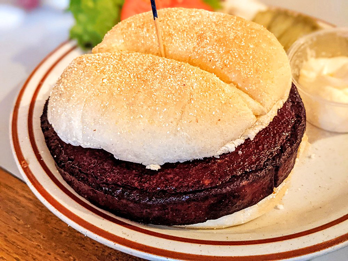 Simplicity that speaks volumes. This classic burger doesn't need fancy toppings or Instagram filters&mdash;just quality beef, proper cooking, and a soft bun to bring it all home.
