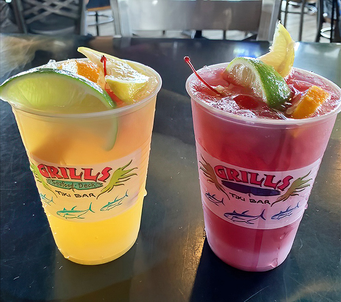 Tropical drinks that look like liquid sunshine. The kind of beverages that demand you put your phone away and commit to the moment.