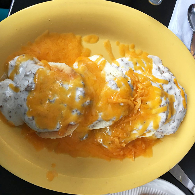 Biscuits swimming in a sea of sausage gravy&mdash;the breakfast equivalent of getting a warm hug from your grandmother who secretly knows how to make everything better.