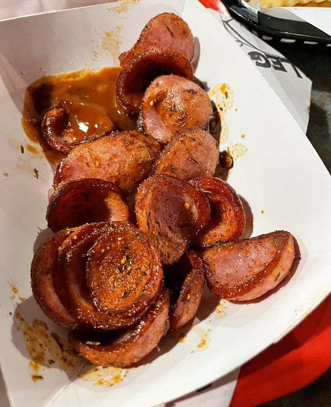 Smoked sausage slices glistening with sauce&mdash;proof that circles can indeed be the perfect shape for delivering happiness.