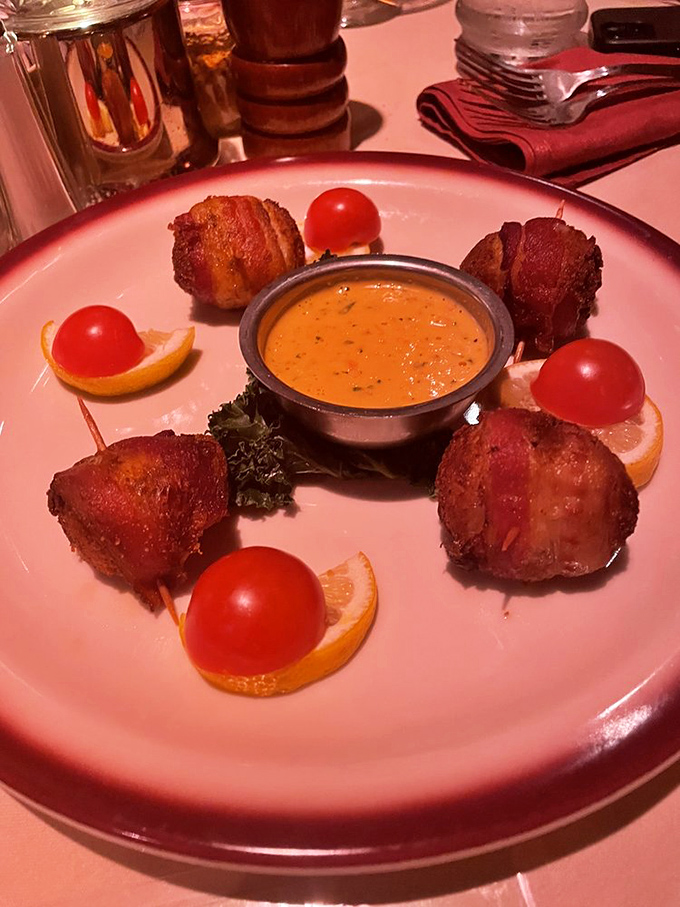 Bacon-wrapped scallops arranged like a delicious clock face, with dipping sauce at high noon. Time stops when flavor is this good.