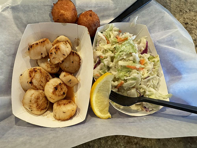 Perfectly seared scallops alongside crisp slaw&mdash;a study in contrasts that works so well, it should be taught in culinary schools.