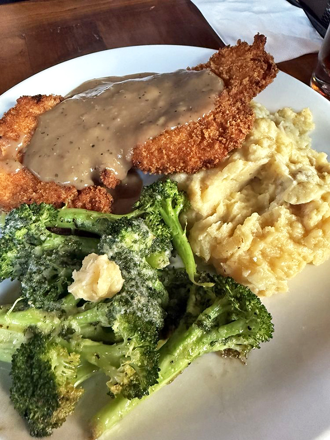 The schnitzel that launched a thousand sighs. Perfectly golden and crisp, swimming in gravy that would make your grandmother weep with joy.