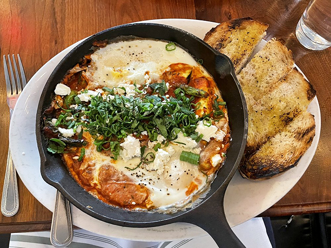 This skillet of bubbling eggs, tomato sauce, and cheese isn't just breakfast&mdash;it's the kind of dish that makes you reconsider your life choices.