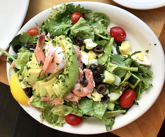 Summer on a plate, no sunscreen required. Fresh shrimp, avocado, and greens combine for a salad that makes eating healthy feel like cheating.