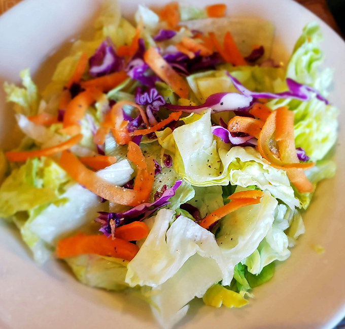 A side salad that defies the sad-salad stereotype. Vibrant, fresh, and colorful enough to make you momentarily believe you're making healthy choices.