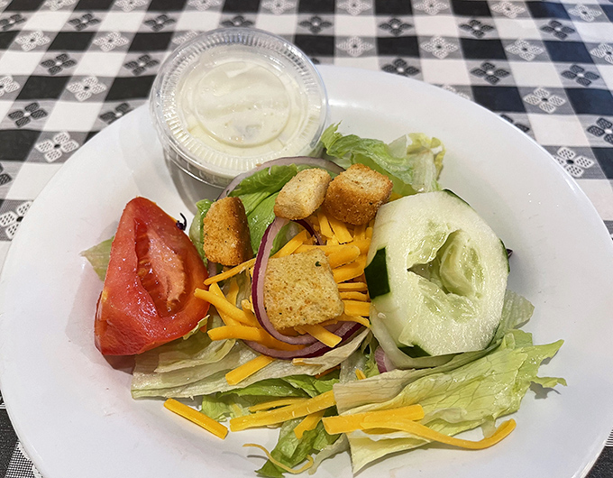 Even the side salad gets special attention here&mdash;crisp, colorful, and a noble companion for those moments when you pretend to be virtuous.