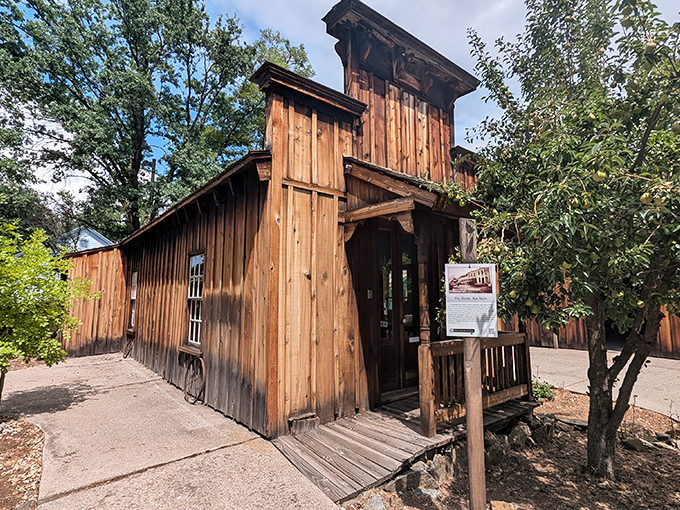 This rustic wooden structure whispers tales of frontier life, when "storage solutions" meant a wooden barrel and "tiny homes" were just called homes.