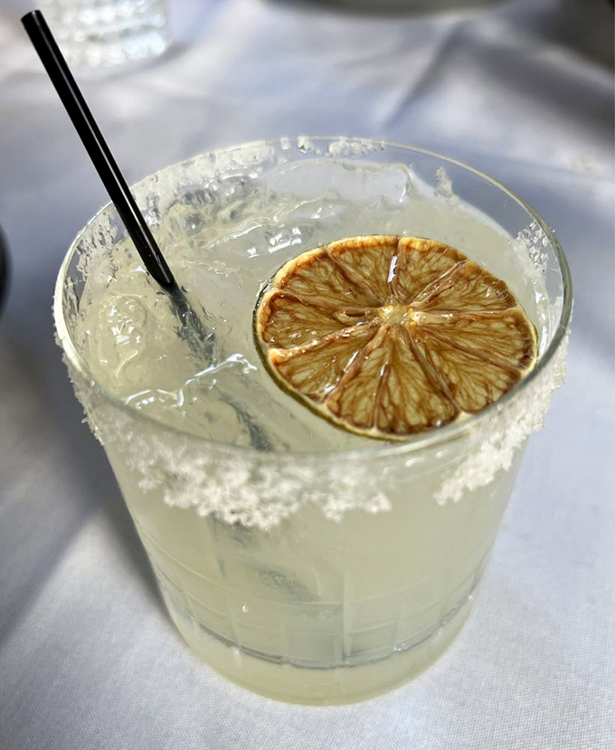 A margarita with a perfectly dehydrated lime wheel&mdash;because sometimes you need something bright and zippy to cut through all that glorious seafood richness.