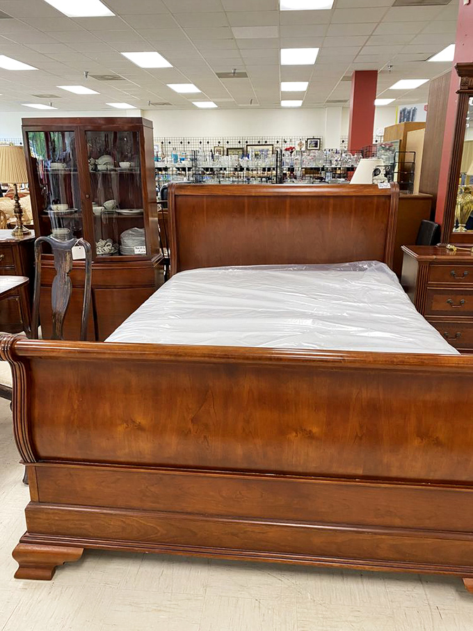 A sleigh bed fit for Santa himself—solid wood craftsmanship that laughs at IKEA's assembly instructions and will outlive your mortgage.