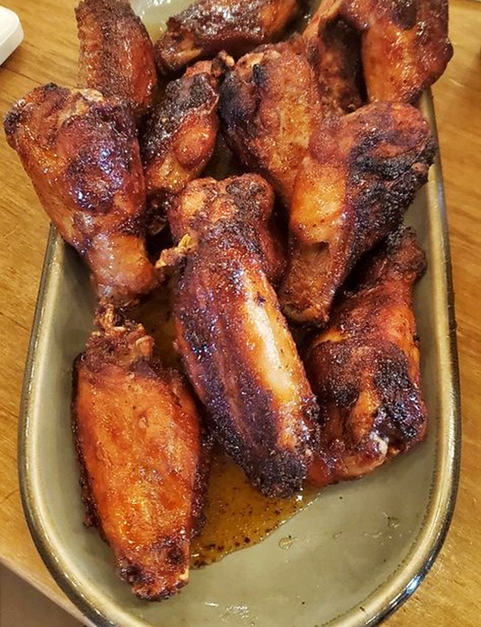 These wings have clearly been introduced to smoke and spice in a way that makes you wonder if chickens evolved specifically for this purpose.