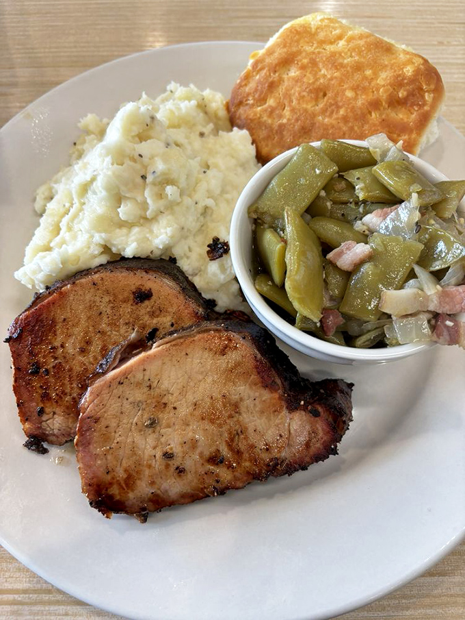 Smoky pork loin meets country-style green beans and mashed potatoes. Grandma would approve, then ask for the recipe.