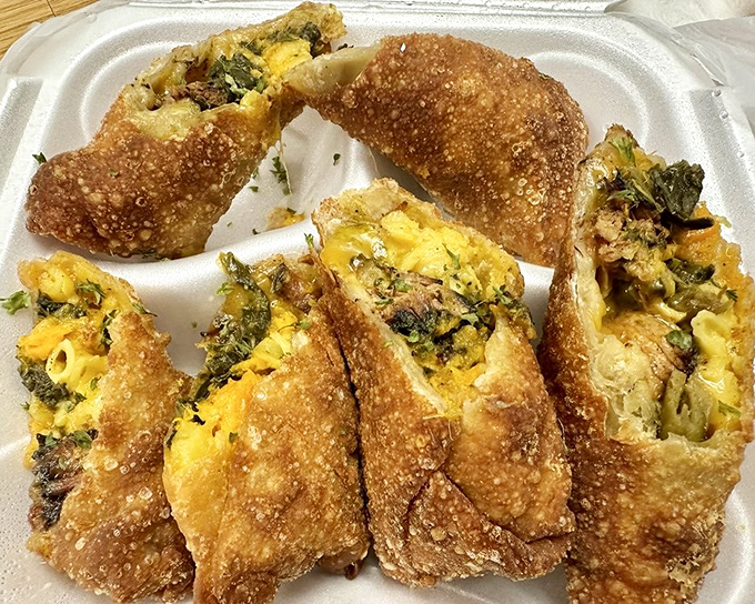 Soul rolls - where traditional egg rolls meet Southern ingenuity. Crispy outside, savory inside, and completely impossible to share without regret.