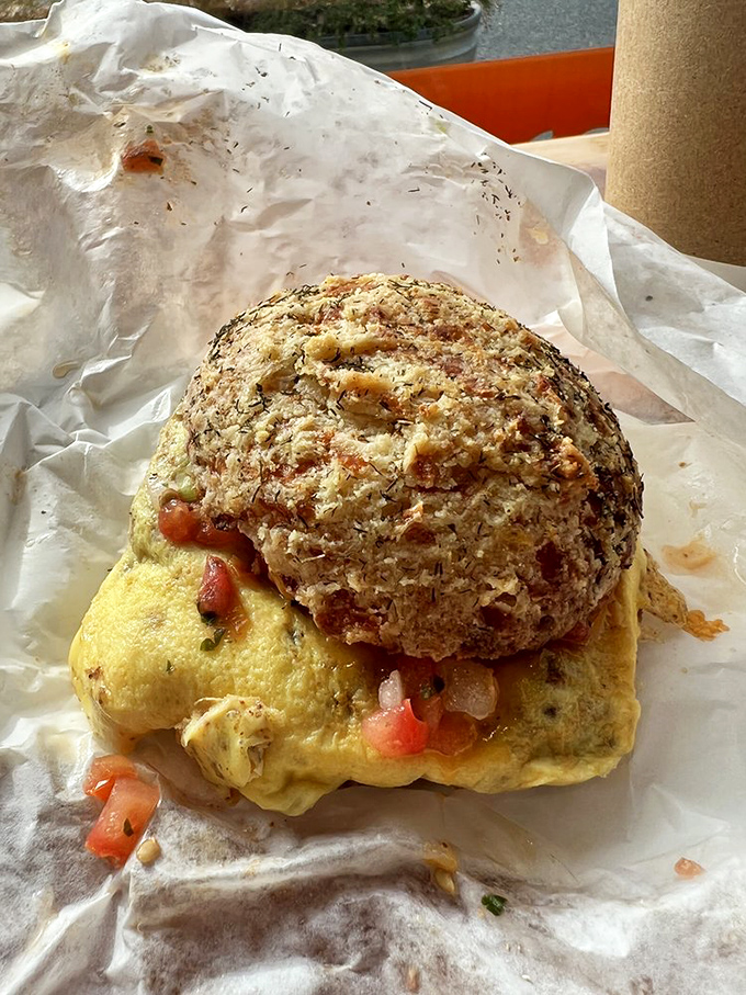 Breakfast alchemy: a golden biscuit cradling eggs and chorizo that transforms "morning fuel" into "the reason you set your alarm."