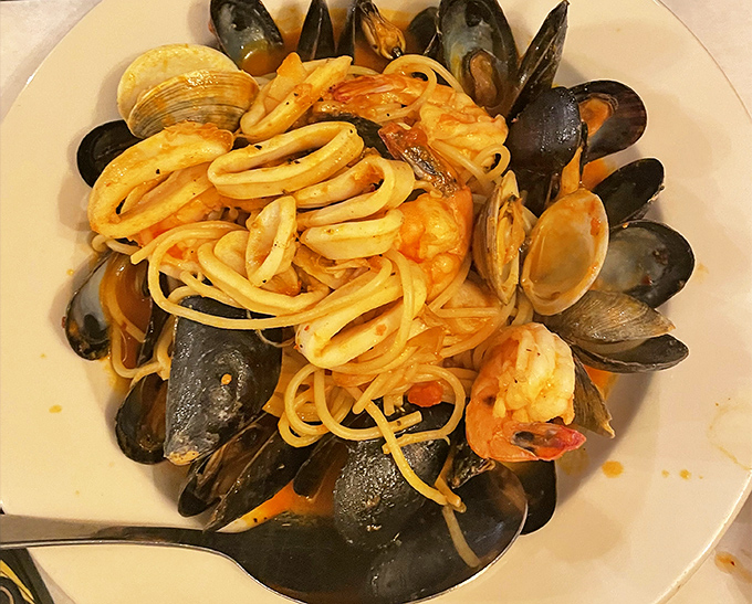Mussels, clams, and pasta unite in oceanic harmony &ndash; it's like the sea decided to hug you.