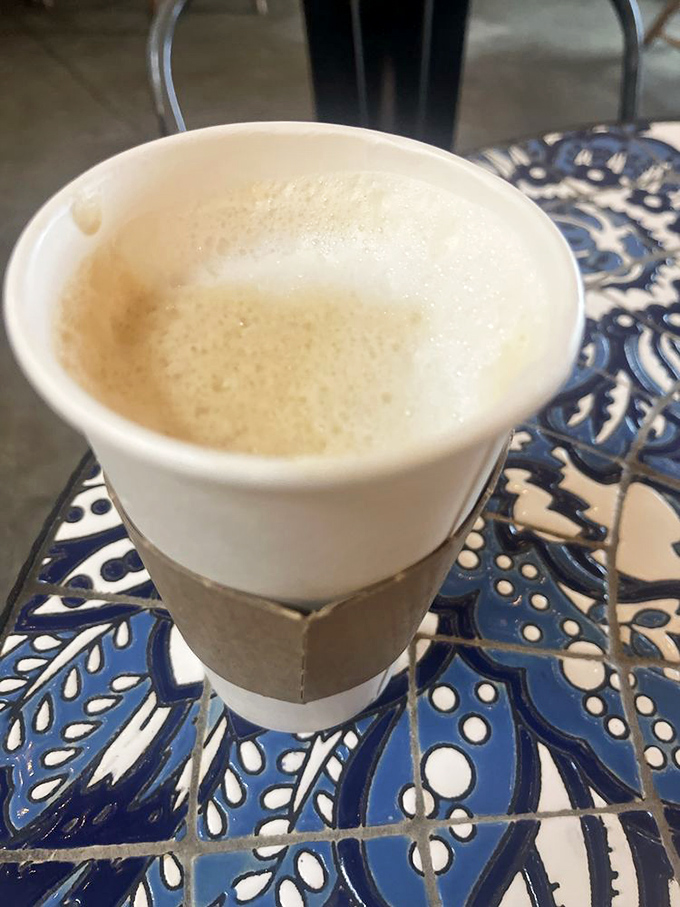 Coffee served on a handcrafted mosaic table&mdash;because sometimes the vessel and setting are as important as what's inside the cup.