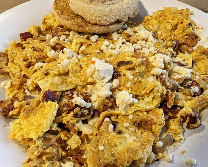 This isn't just a "trash plate"&mdash;it's a beautiful chaos of eggs, cheese, and potatoes that somehow makes perfect sense at 9 AM.