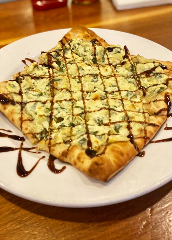 Flatbread that proves vegetables can party too. That balsamic drizzle is like the perfect accessory&mdash;it completes the outfit without showing off.