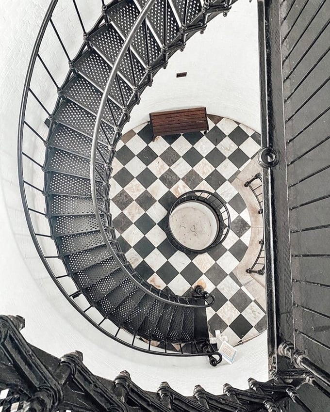 The lighthouse's spiral staircase is a dizzying work of art&mdash;219 steps of iron lace that would make M.C. Escher reach for his sketchpad.