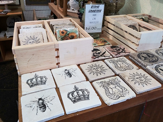 Stone coasters with bees and crowns&mdash;because your coffee table deserves jewelry too. At $6 each, these little slabs of personality are practically giving themselves away.
