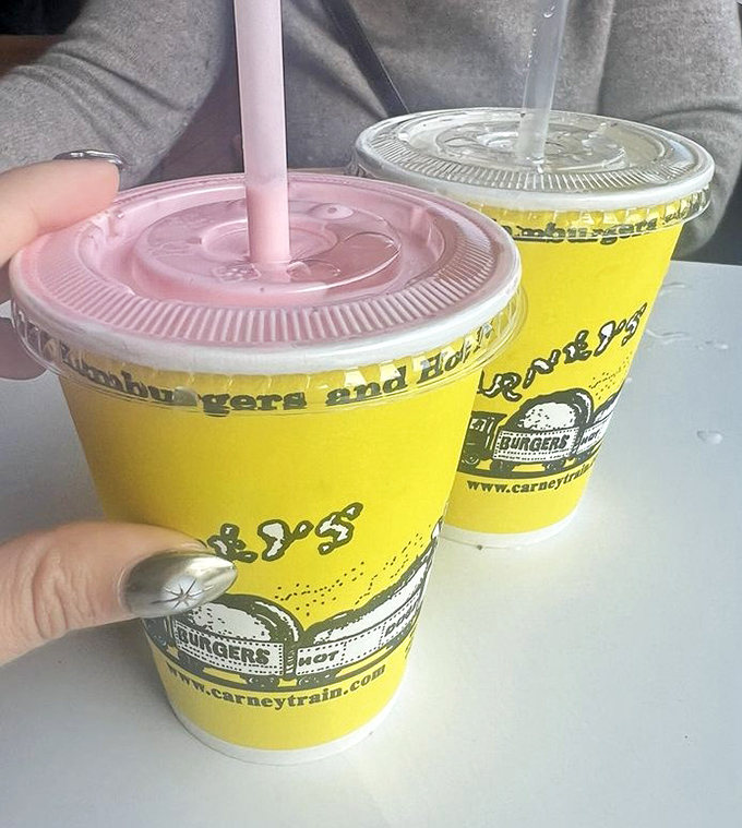 Sunshine in a cup! These vibrant yellow shakes come with the promise of brain freeze and childhood memories, worth every delicious sip and inevitable sugar rush.
