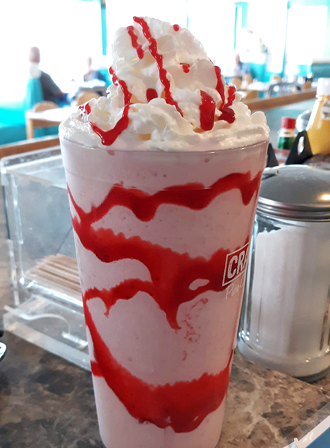 This strawberry milkshake isn't just a drink&mdash;it's a striped masterpiece that makes you wonder why museums don't have dessert exhibits.