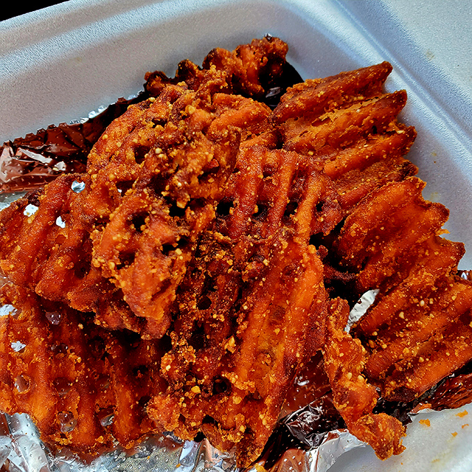 Sweet potato waffle fries dusted with spices that could make even the most dedicated kale enthusiast temporarily renounce their healthy lifestyle. Worth every calorie.