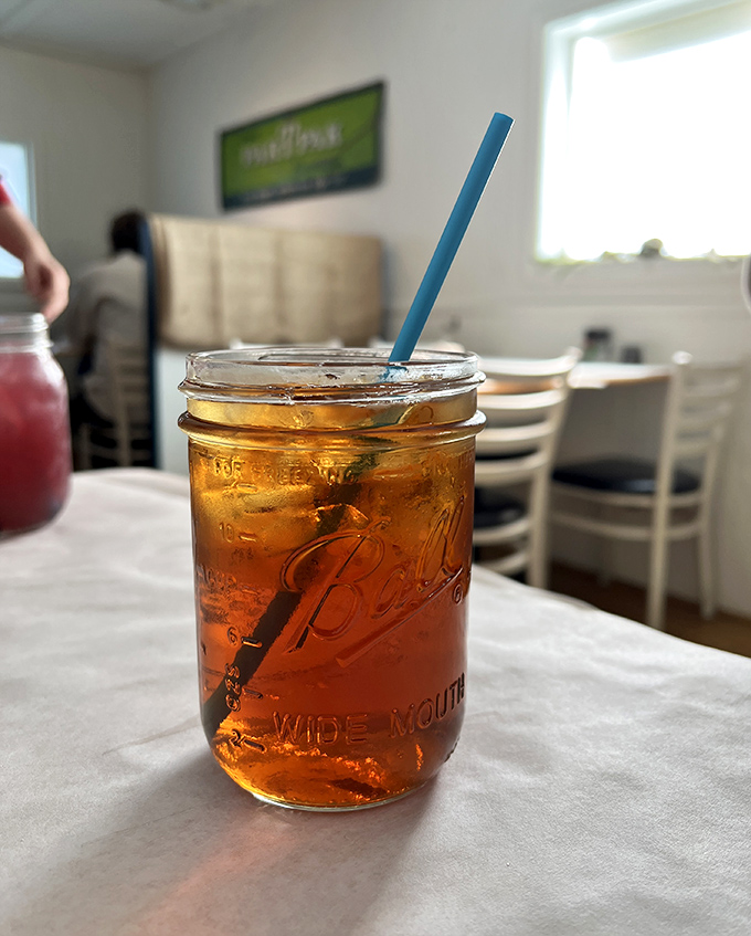 Sweet tea served in a Mason jar isn't just a drink&mdash;it's liquid Southern sunshine, offering refreshment with a side of nostalgia.