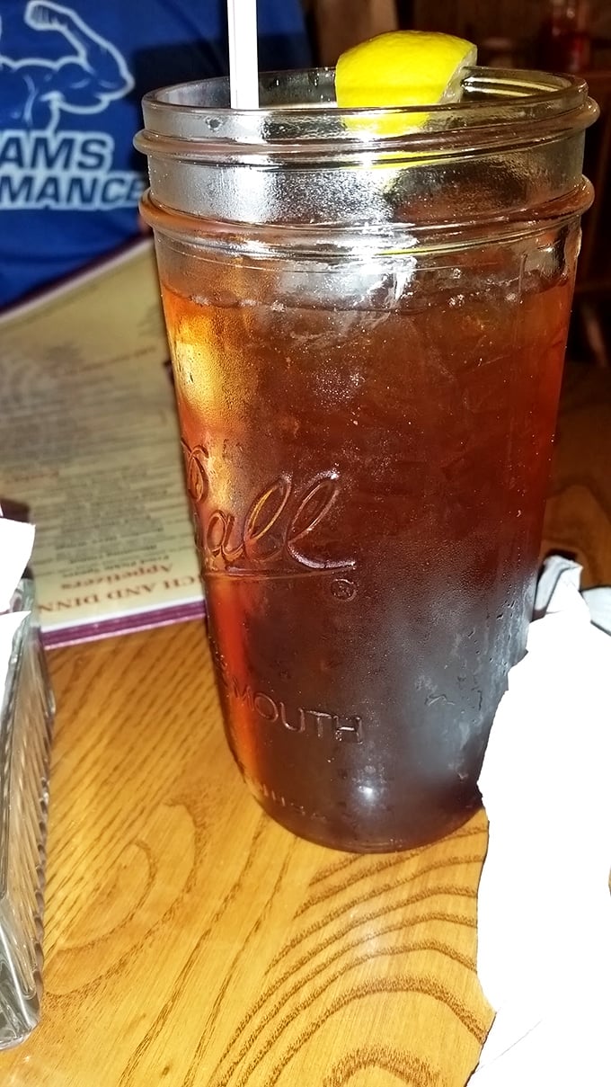 Sweet tea served in a proper Mason jar with lemon&mdash;the unofficial champagne of the South and nature's perfect air conditioning.