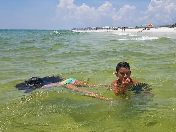Swimming in waters so clear you could read your Kindle through them. The Gulf's natural swimming pool, minus the chlorine, plus the magic.