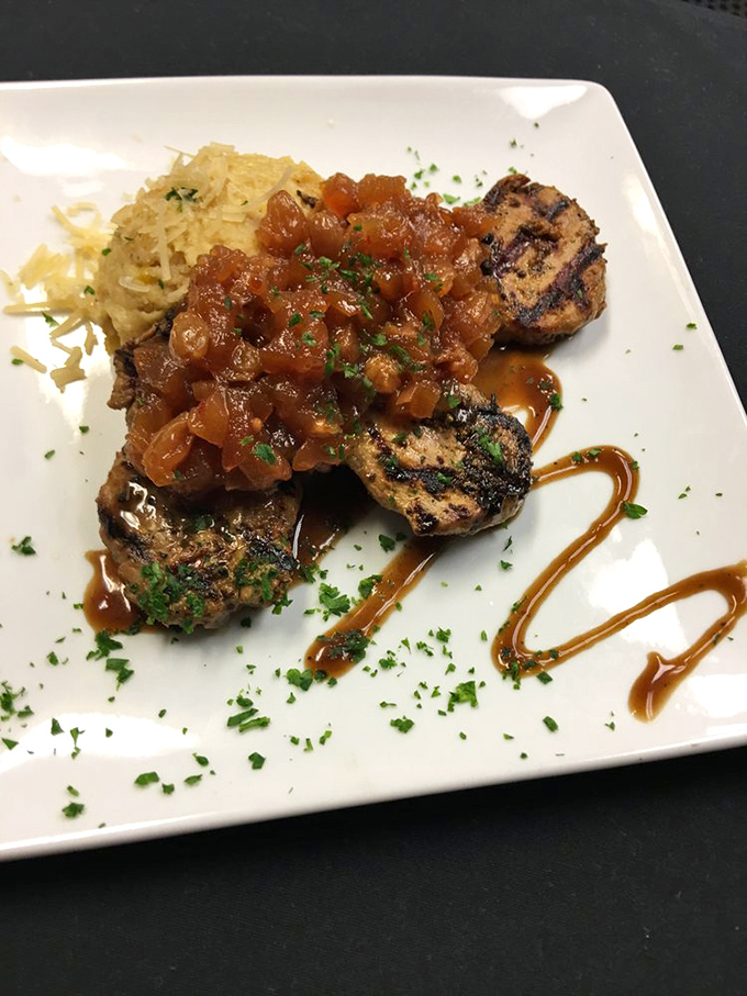 Tenderloin that makes you question your seafood order. The tomato relish adds brightness to a dish that proves this coastal gem isn't just about things with fins.