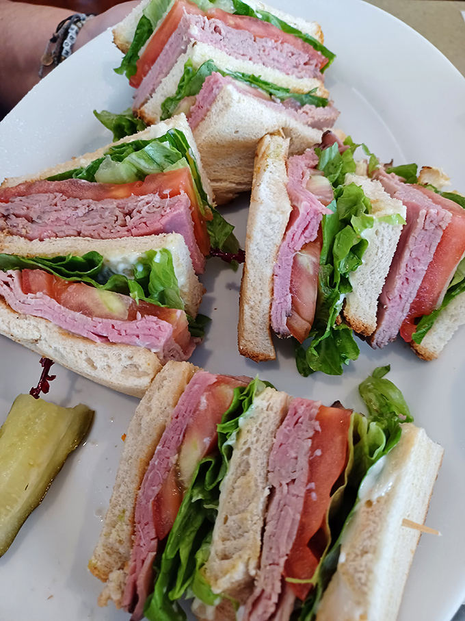 The club sandwich &ndash; architecture's greatest contribution to lunch. These perfectly stacked layers deserve their own blueprint and building permit.