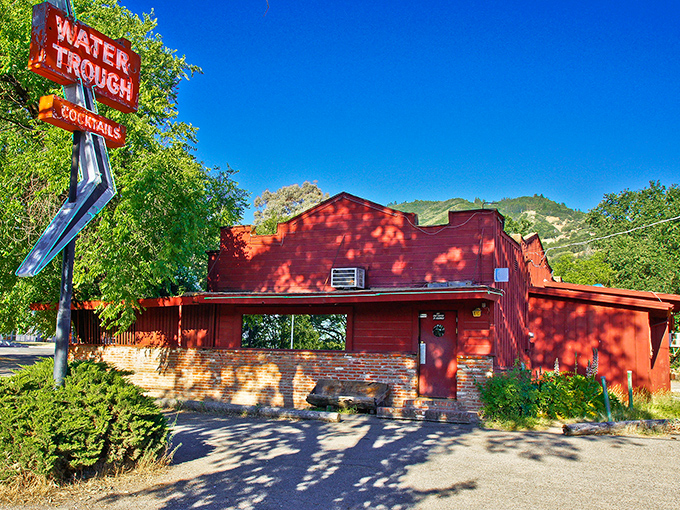 The Water Trough's rustic red exterior and vintage sign suggest the kind of local watering hole where everybody knows your name&mdash;and probably your drink order too.