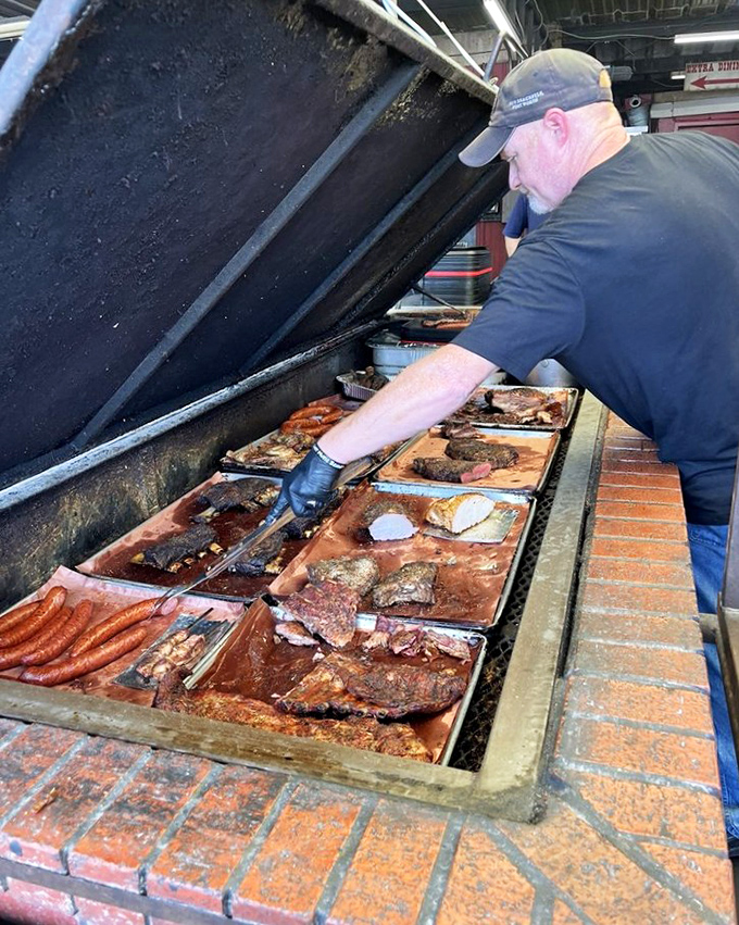 The pit&mdash;where magic happens and meat transforms from ordinary to extraordinary under the watchful eye of smoke masters.