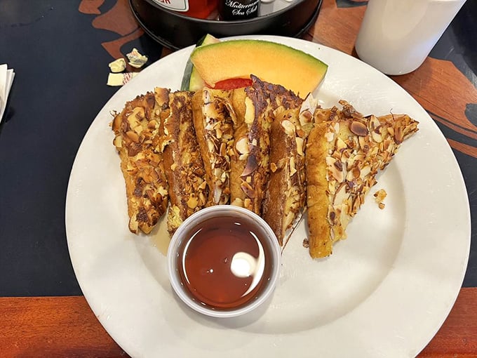 French toast that's dressed for success with a nutty entourage. The slice of melon is like the perfect opening act before the main event.