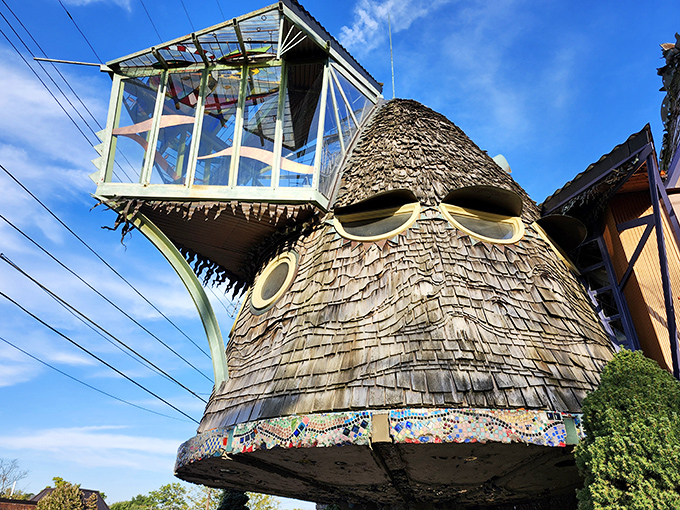 From this angle, the glass observation deck perches atop the mushroom cap like a treehouse for grown-ups with architectural degrees.