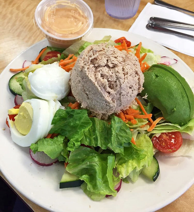A tuna salad that respects itself enough to include fresh vegetables and perfectly boiled eggs. No sad desk lunch here.