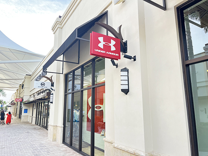 Under Armour's bold signage stands ready to outfit weekend warriors and professional couch athletes alike with performance gear.